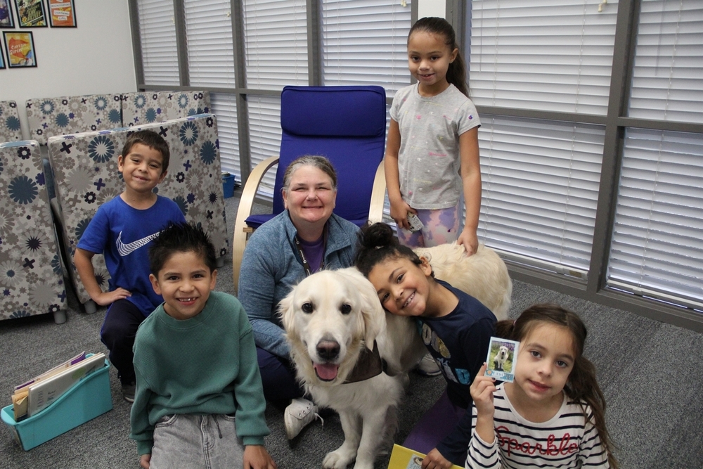 Therapy Dogs Helps Dove Students with Reading | Dove Elementary School
